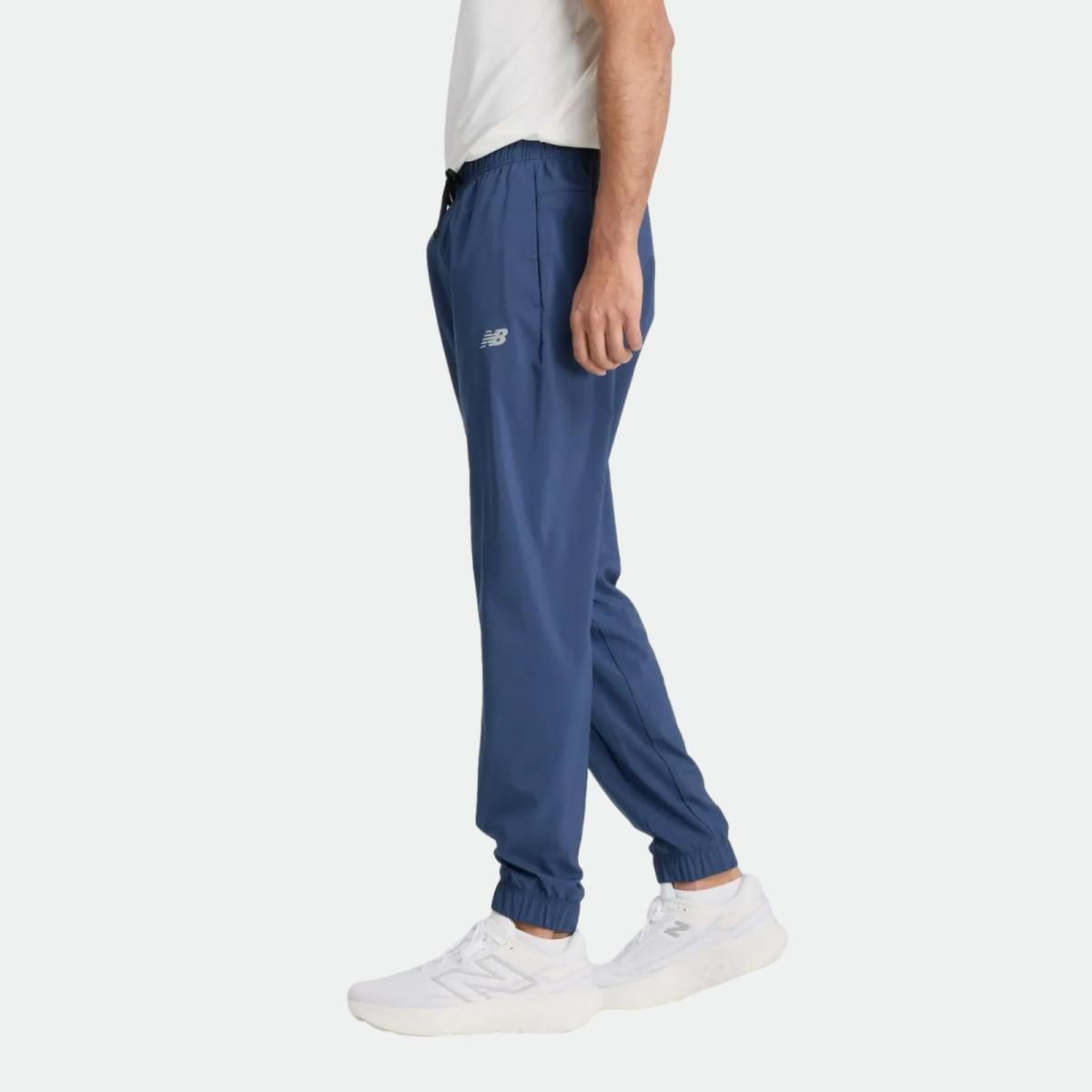 Pantalón New Balance Essentials Woven Hombre - MARINE
